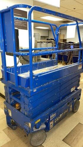 UPRIGHT SCISSOR LIFT MODEL 65700-020 (NO KEY, NEEDS REPAIR, WONT TURN ON)